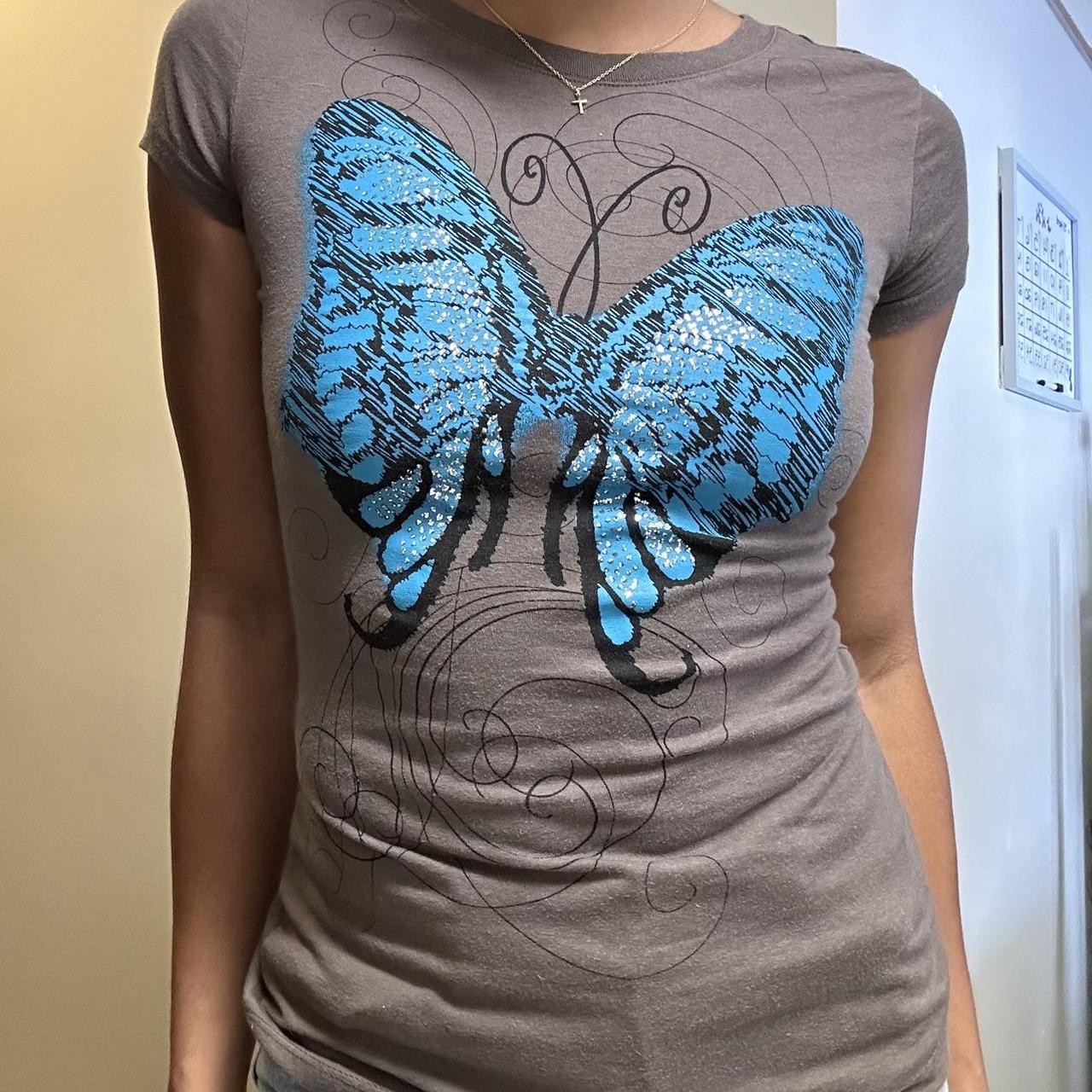 Thrifted blue butterfly top ⭐️long in length down a... | Depop