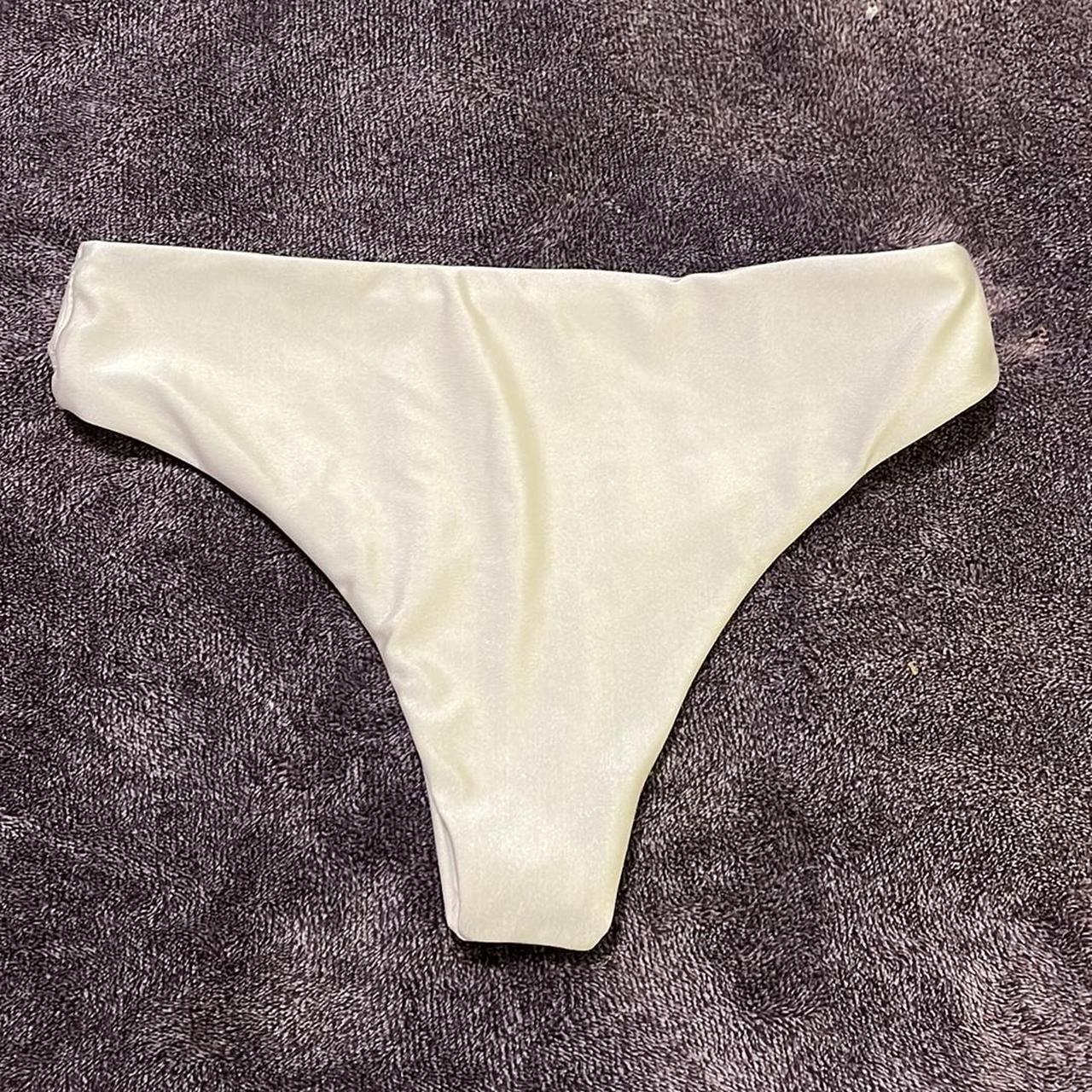 White swimsuit bottom ,only worn once, but has a... - Depop