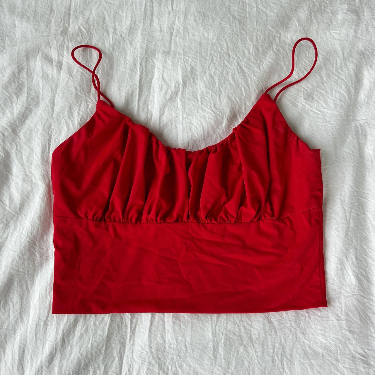 small red tank perfect condition, good for game day... - Depop