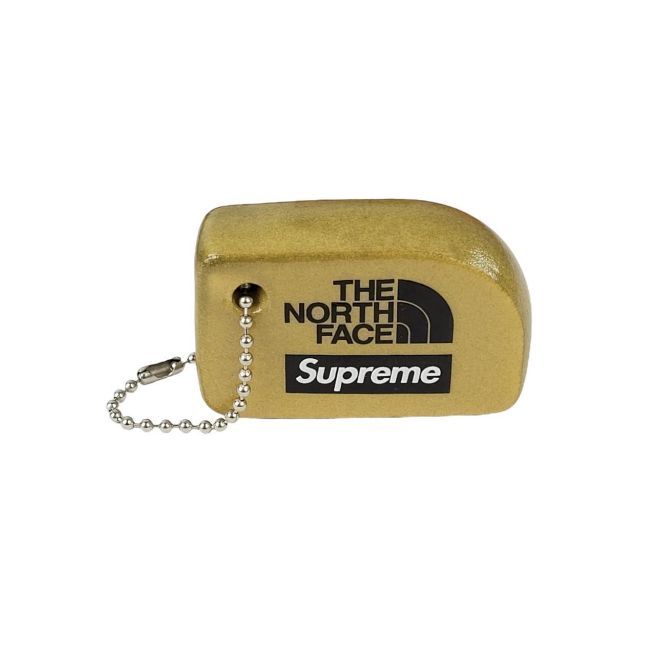 Supreme x The North Face Gold Floating Keyring... - Depop