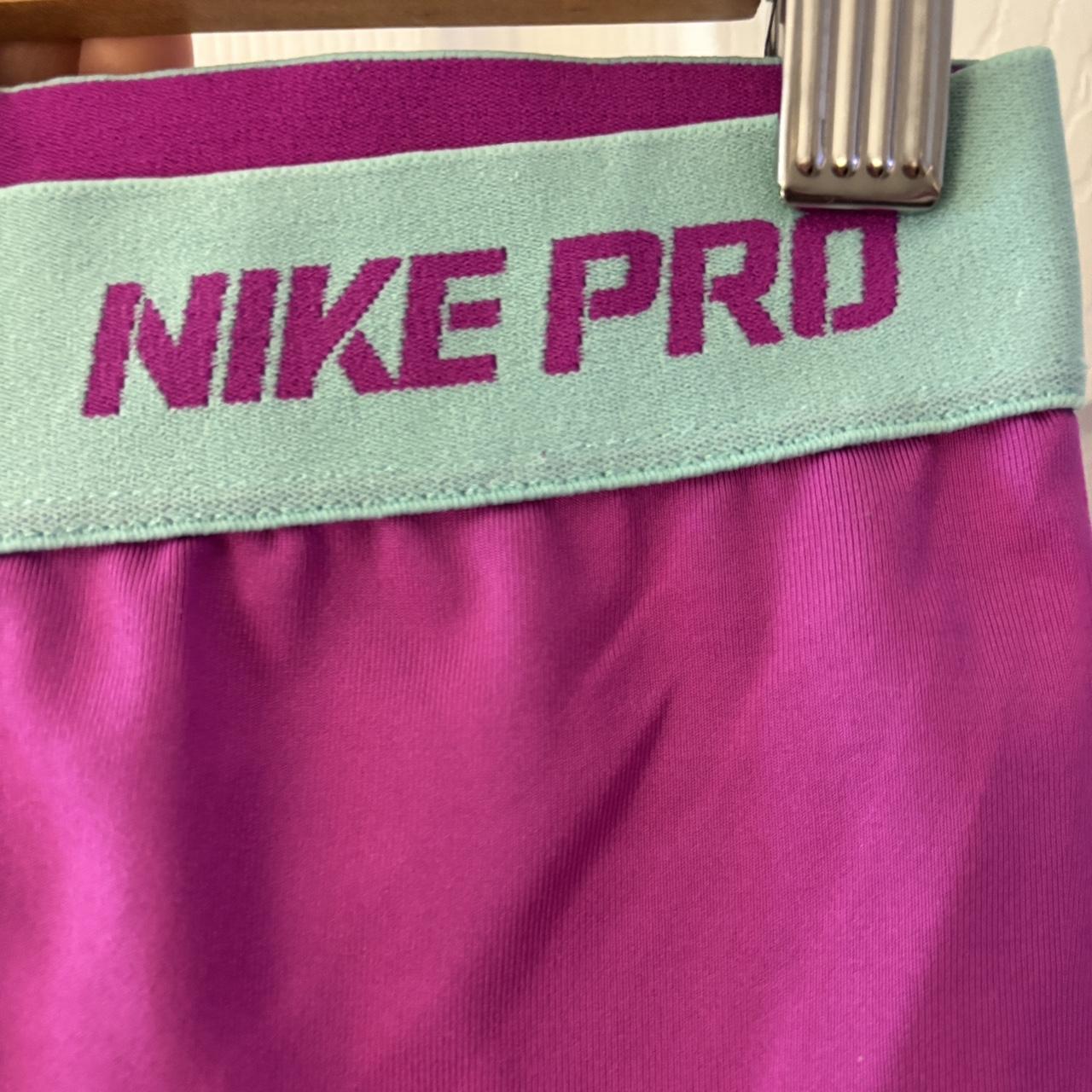 Teal and purple nike pros Size M #nike #nikepros... | Depop