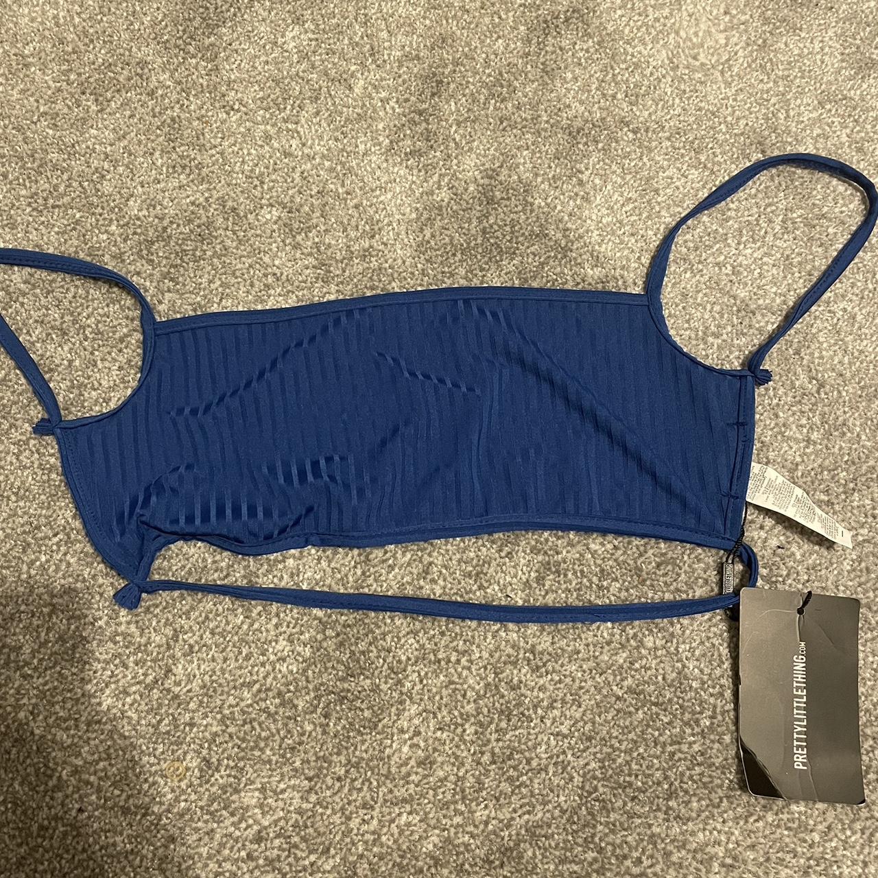 Blue size 12 backless plt top, never been worn still... - Depop