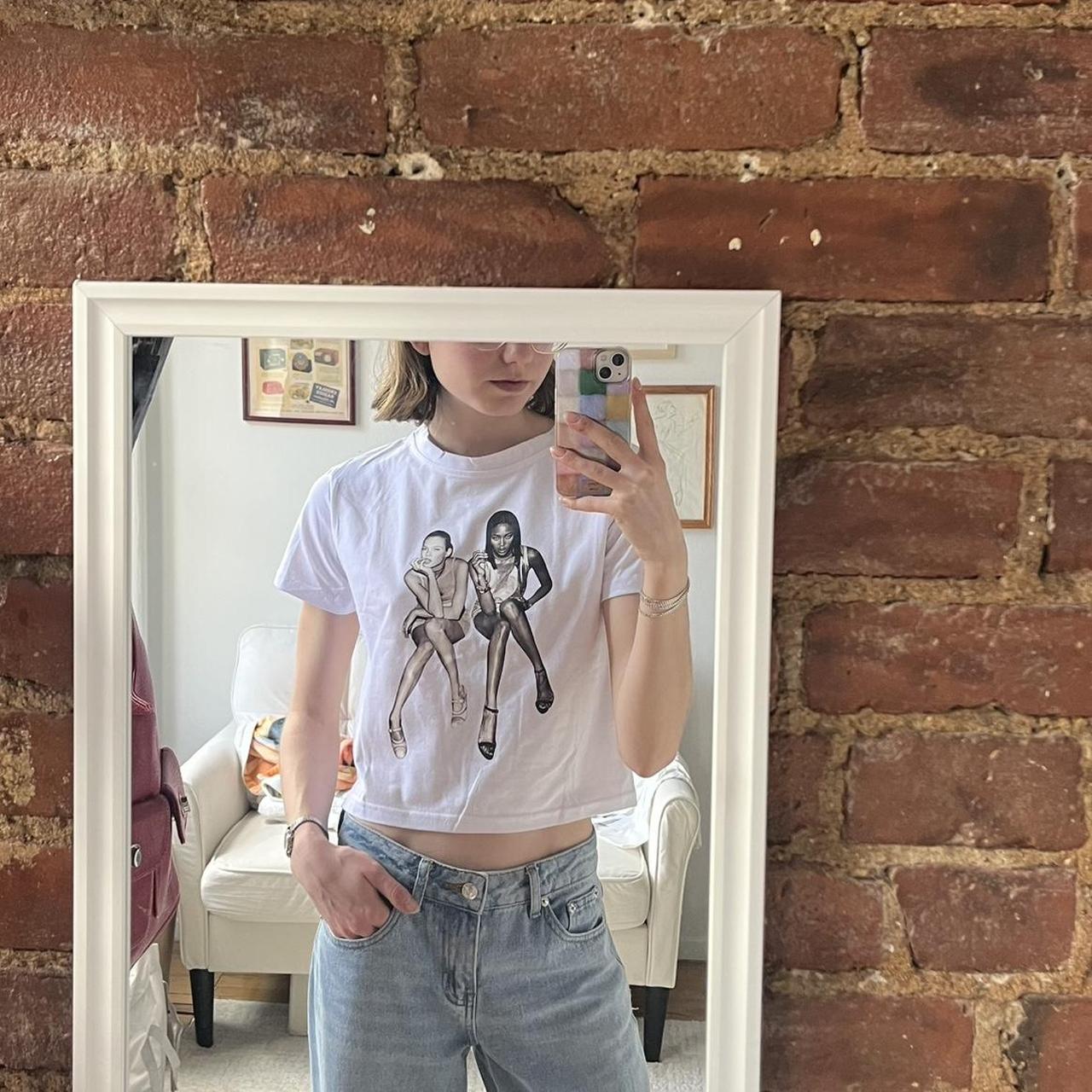 white graphic baby tee ‼️FREE SHIPPING🚨 featuring... | Depop