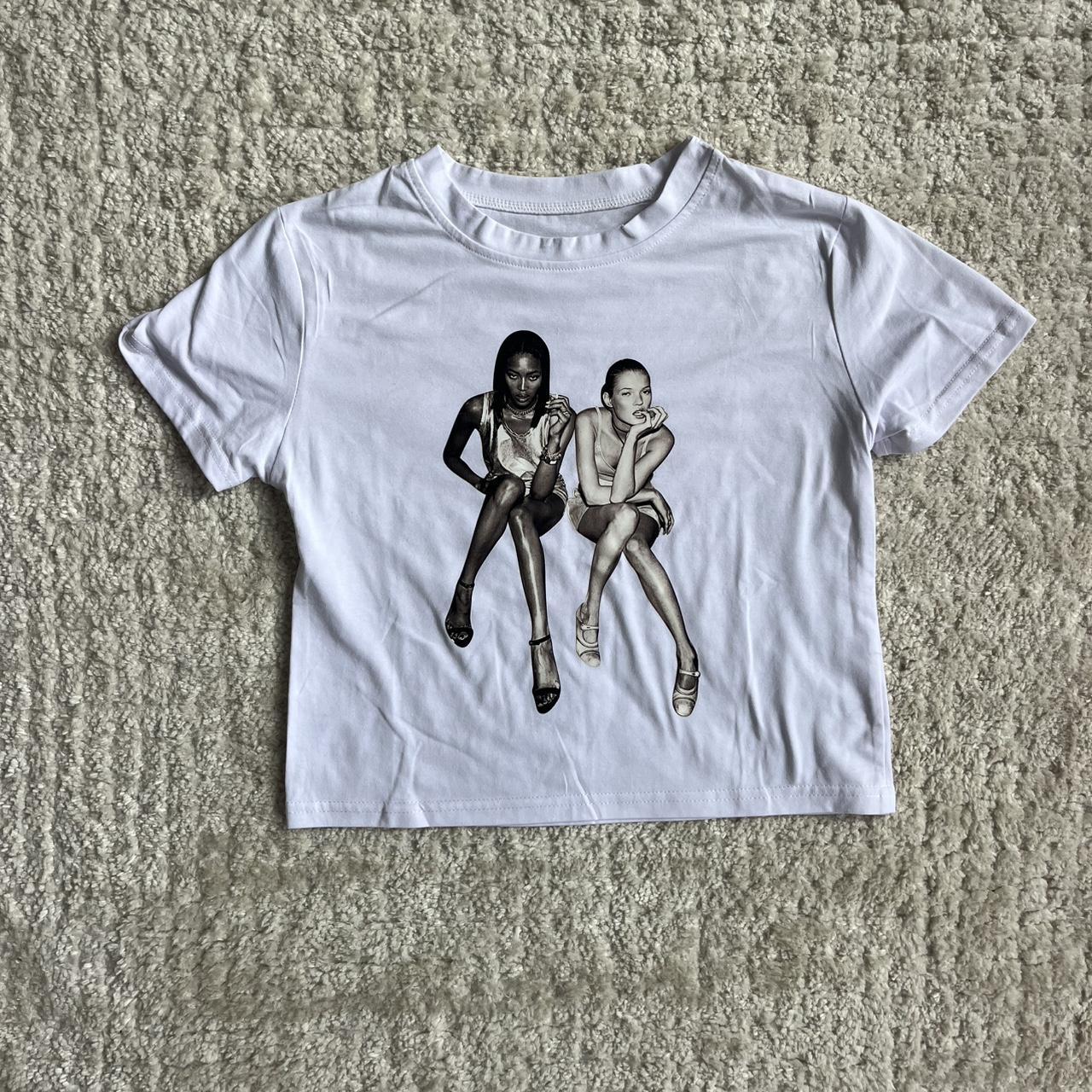 white graphic baby tee ‼️FREE SHIPPING🚨 featuring... | Depop