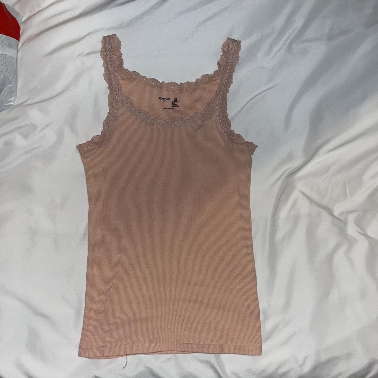 Super cute gap tank it’s a kids medium but can fit... - Depop