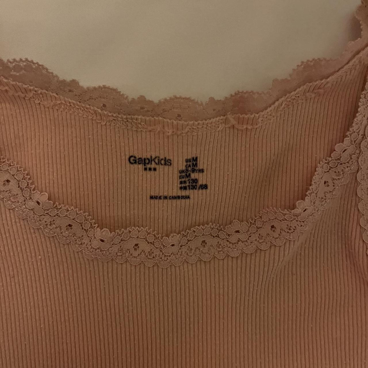 Super cute gap tank it’s a kids medium but can fit... - Depop