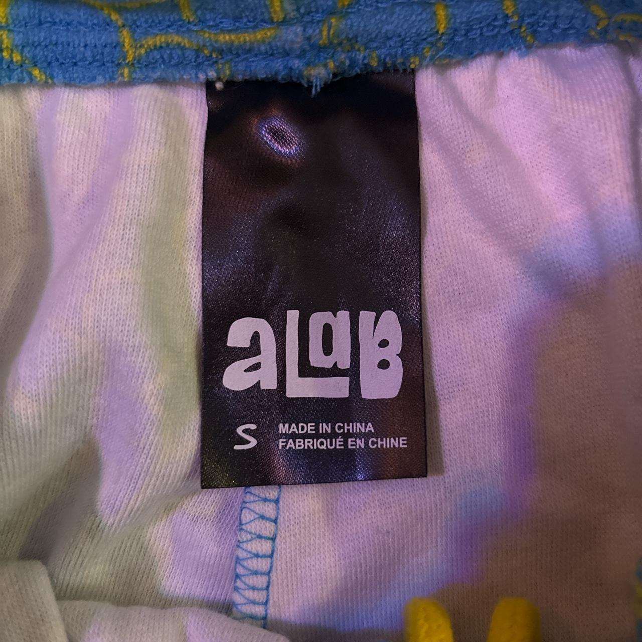 blue and yellow ALAB shorts from zumiez. bought too... - Depop