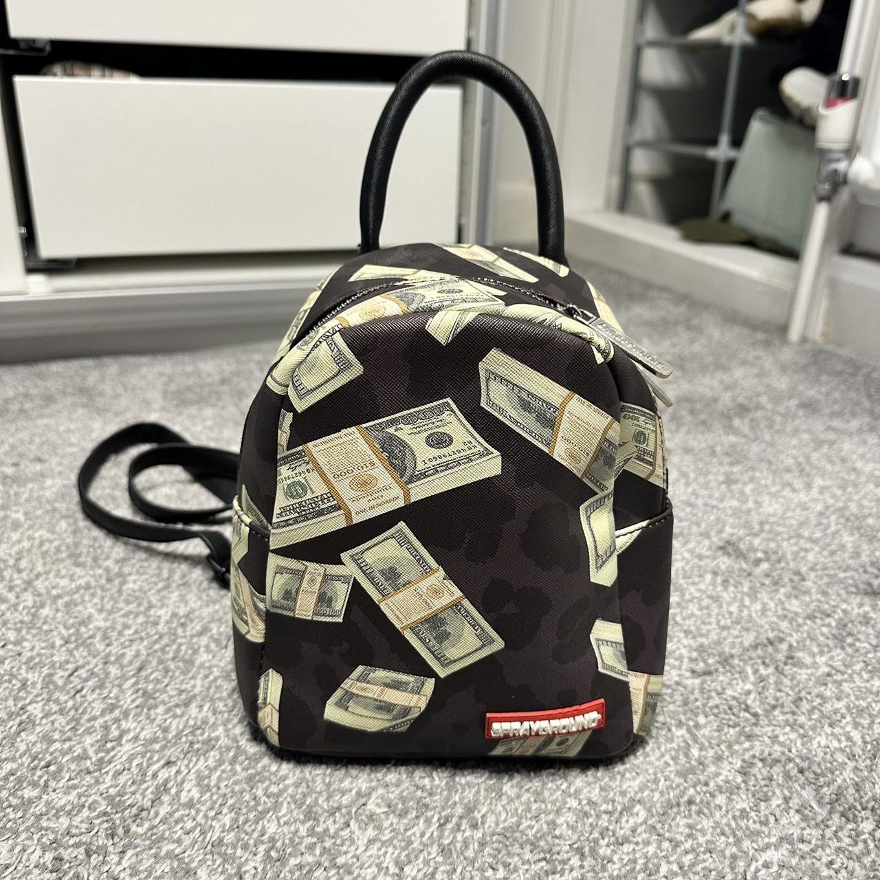 Sprayground limited edition mini dollar packpack.... - Depop