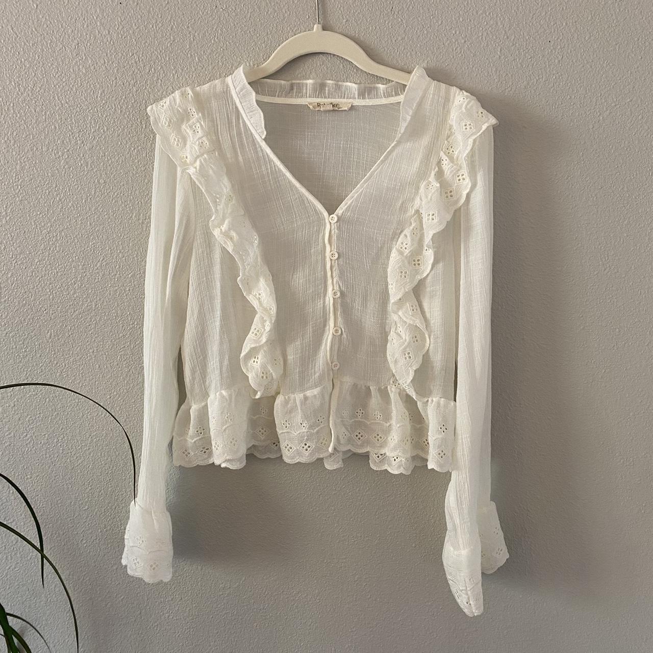 dainty white frilly top with button details.... - Depop