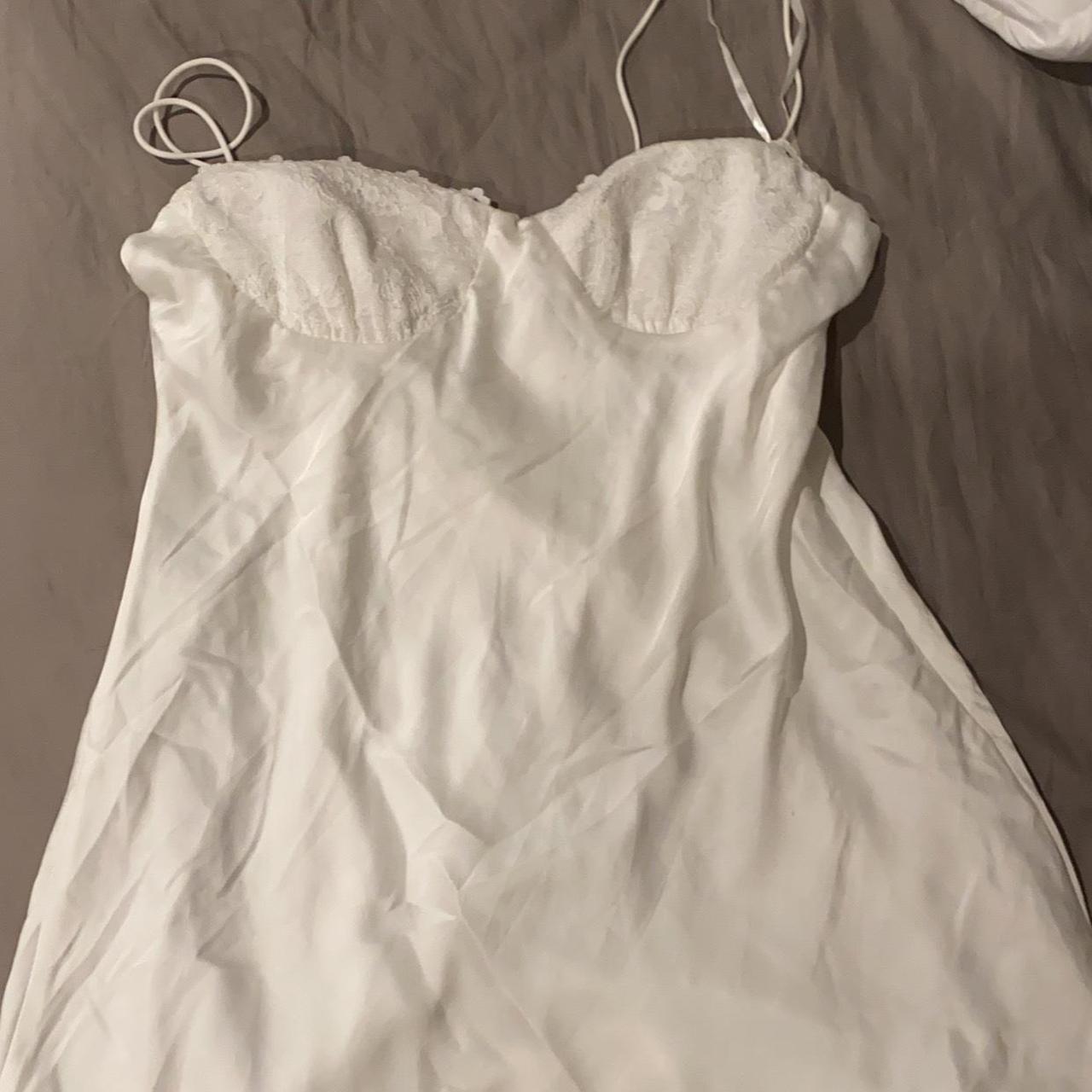 White lace dress with lace detailed leg slit,... - Depop