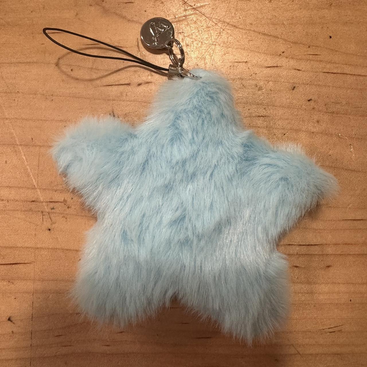 Soft blue faux fur star charm from Wildflower Cases!... | Depop