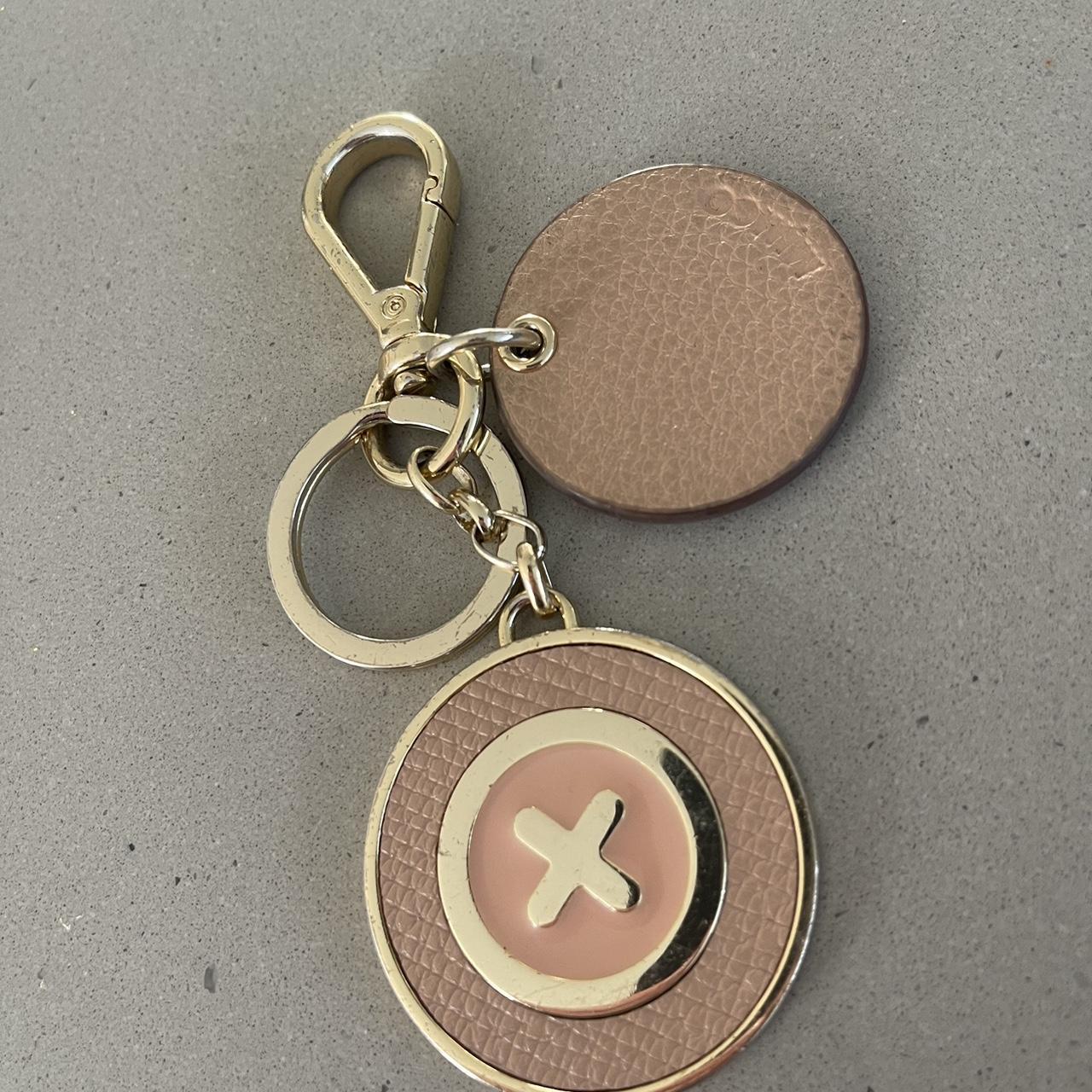 Tan and gold leather keychain with a touch of... - Depop