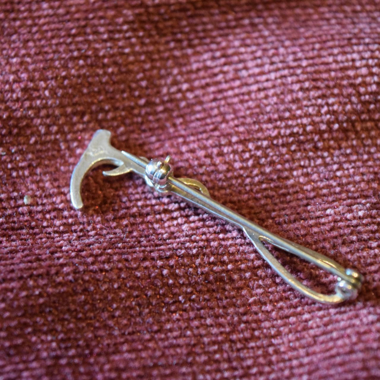 UC87/88/89 Vintage white metal riding crop brooch.... - Depop