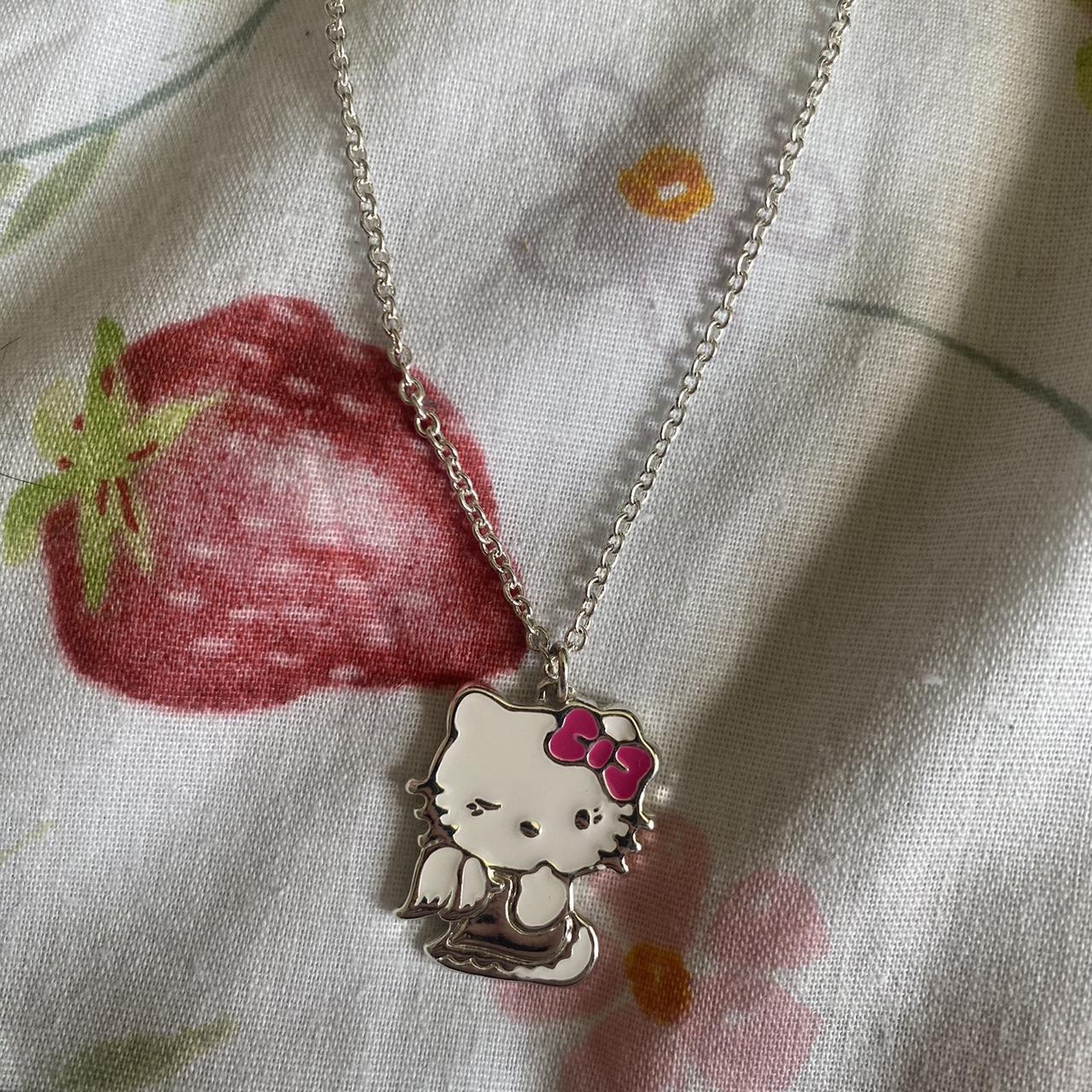 Hello Kitty silver angel necklace open to offers... - Depop