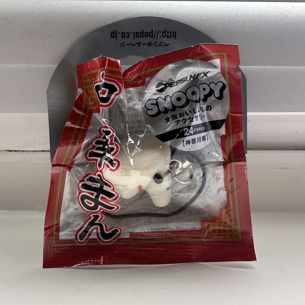 Snoopy laying on dumpling phone charm -new in... | Depop