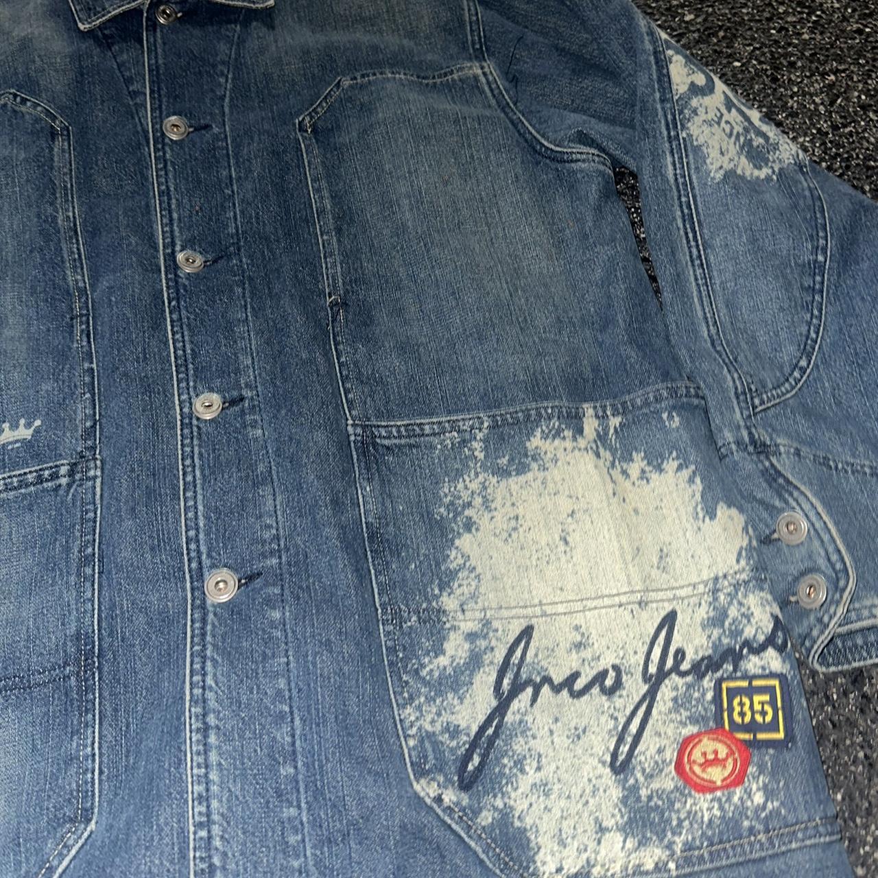 JNCO denim jacket with all over print and distressed... | Depop