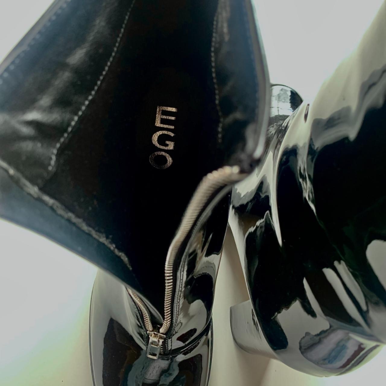 New EGO Black patent/ vinyl heeled boots with... - Depop