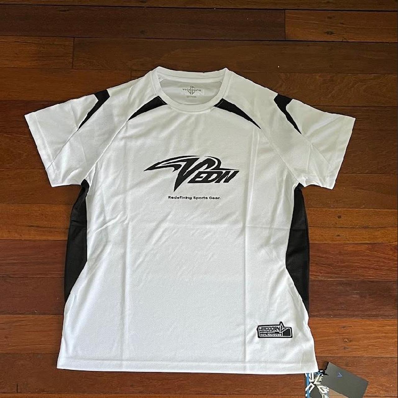 White and black Vedni sports top with a sporty vibe... | Depop