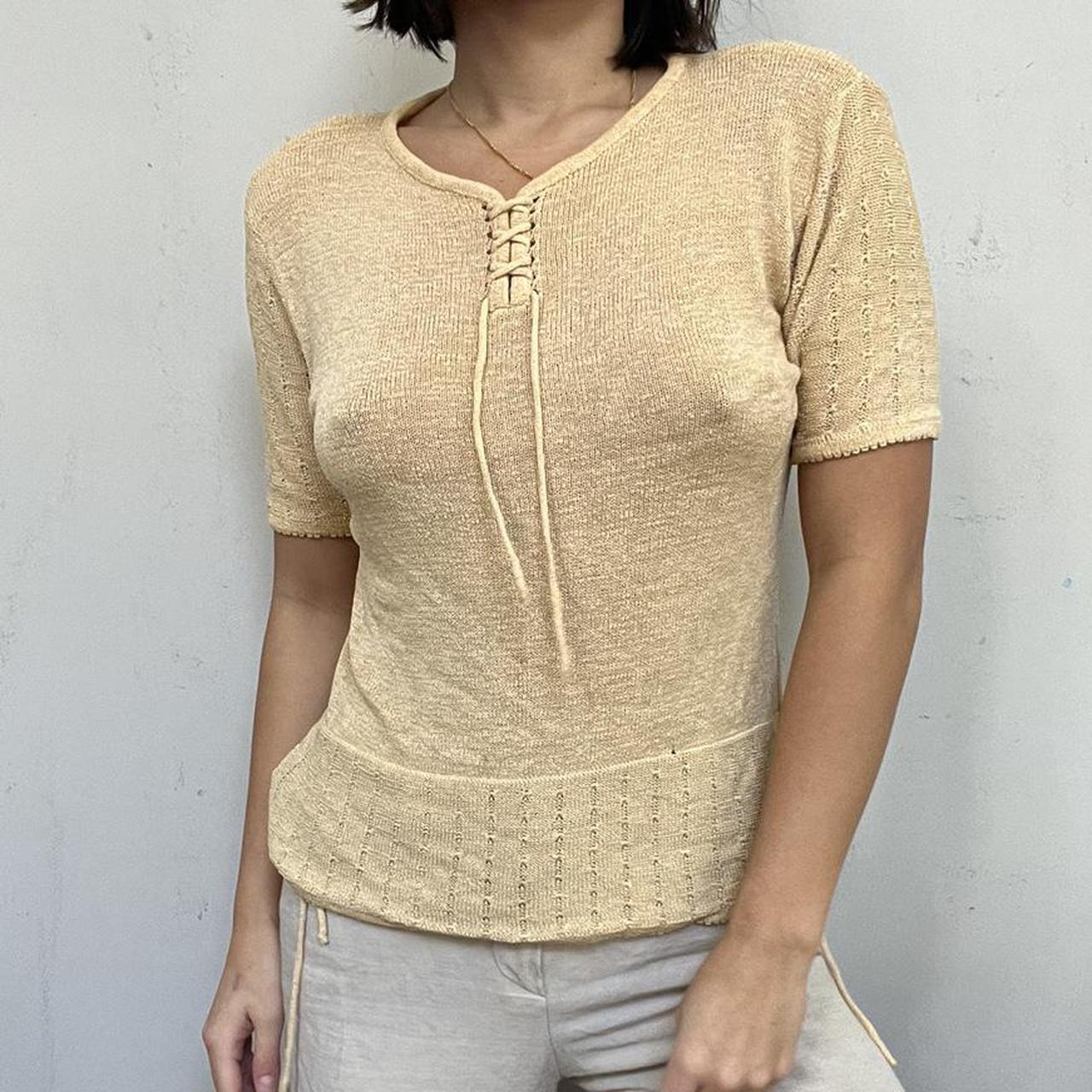 Beige knitted short sleeve top with front and side... - Depop