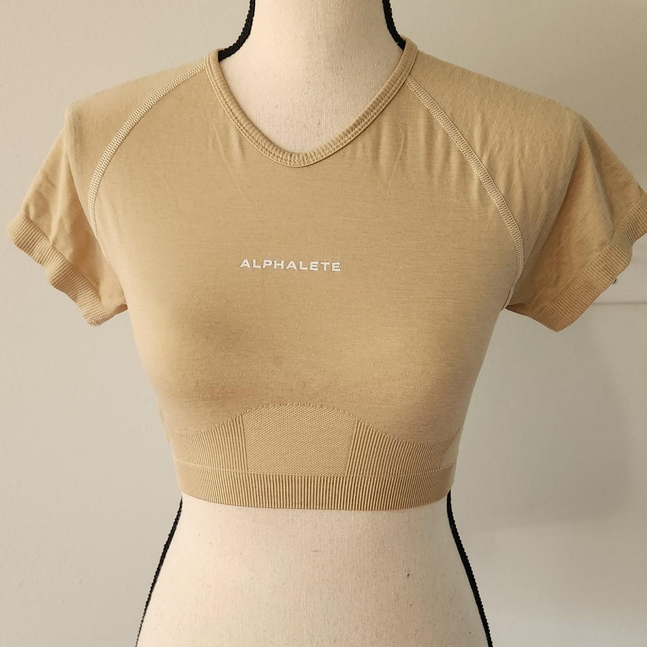Alphalete tan cropped athletic top, medium - Depop