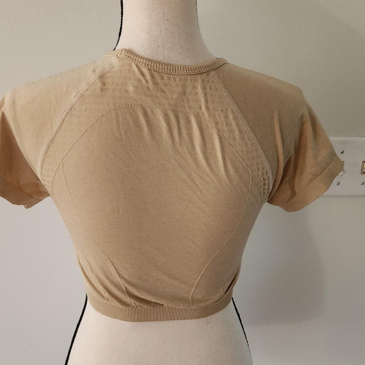 Alphalete tan cropped athletic top, medium - Depop
