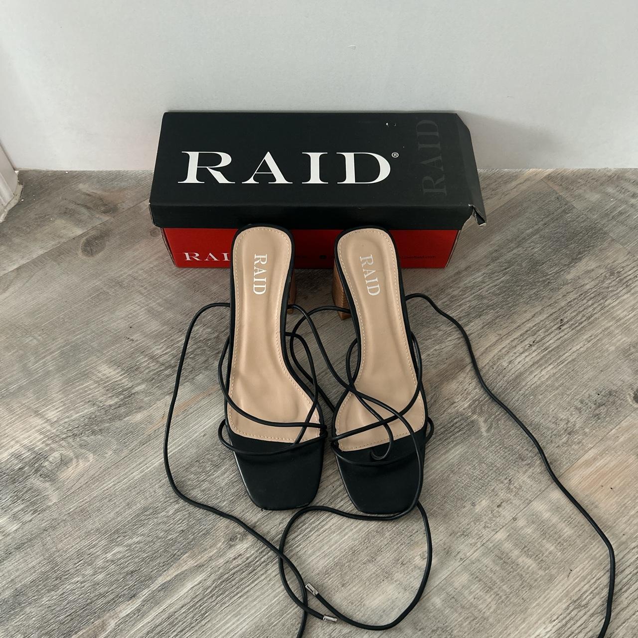 Black strappy, approx. 2.5” with wood-like tan heel. - Depop