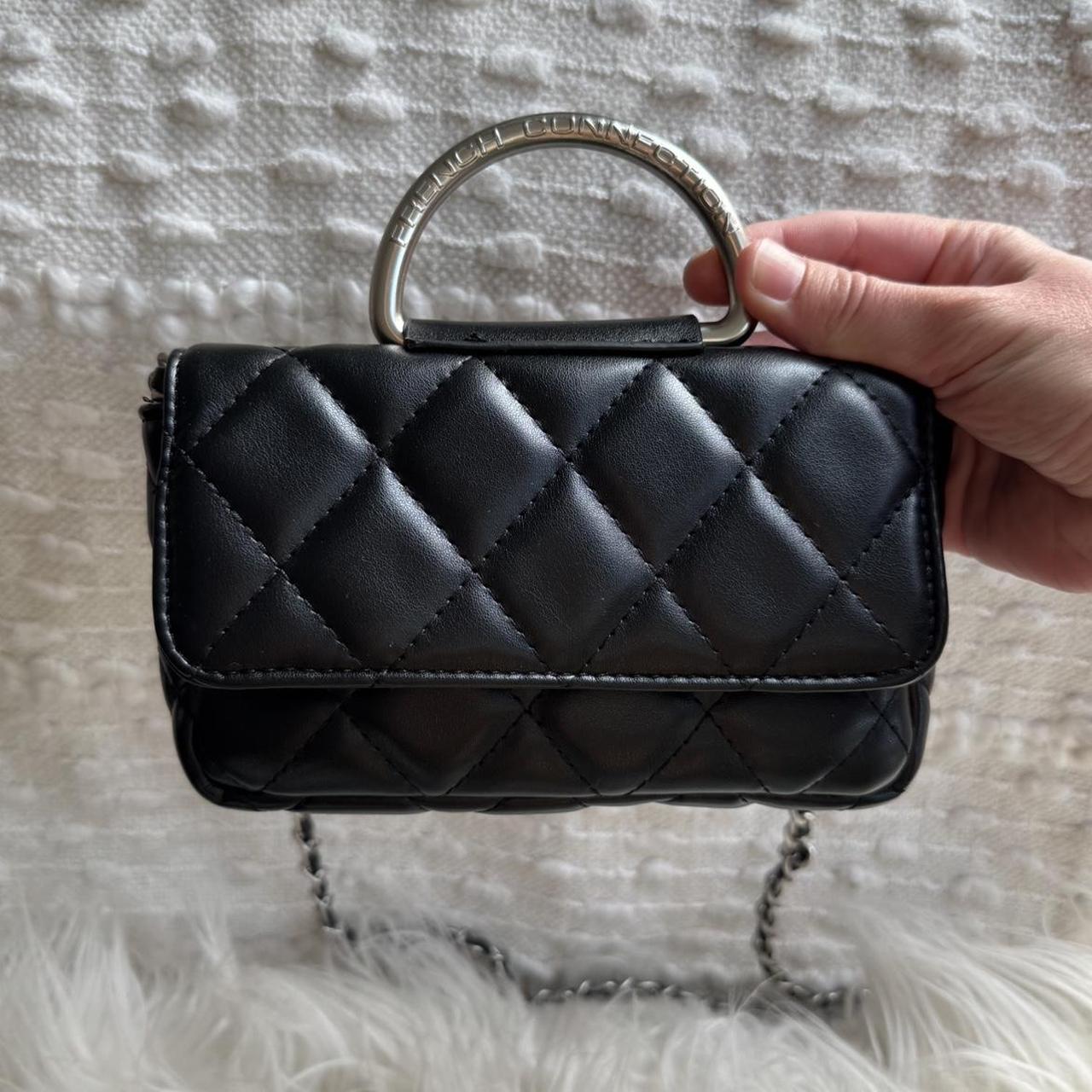 Black quilted crossbody bag with silver hardware... | Depop