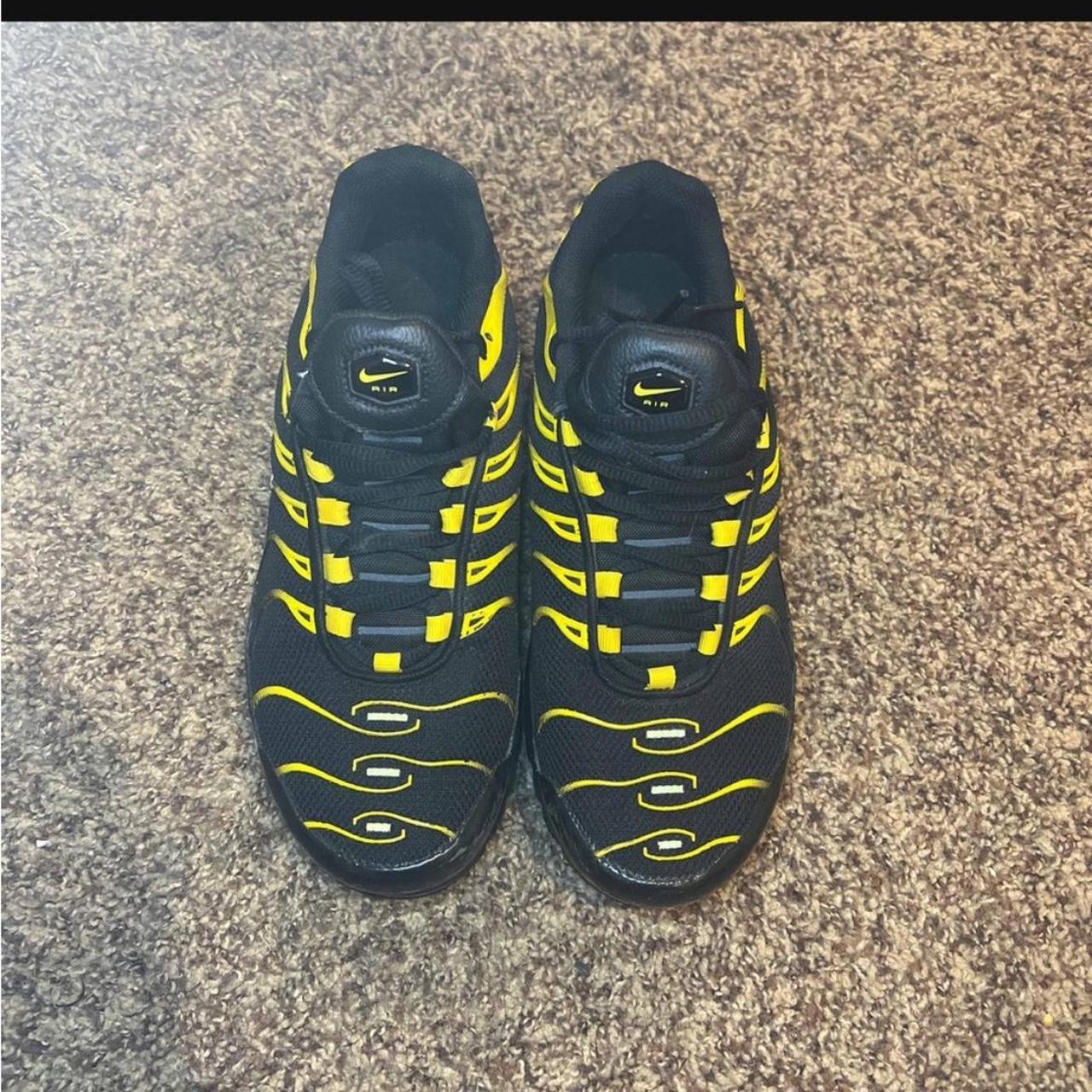 Nike Air Max Plus TN trainers in black and yellow... - Depop