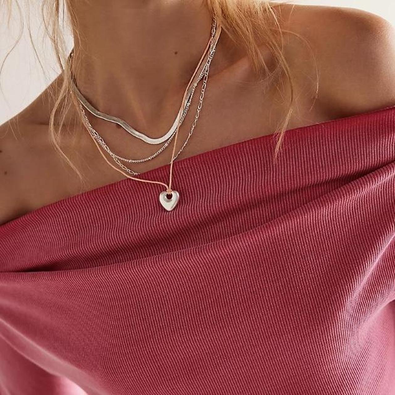 Silver layered necklace with pink string and silver... - Depop