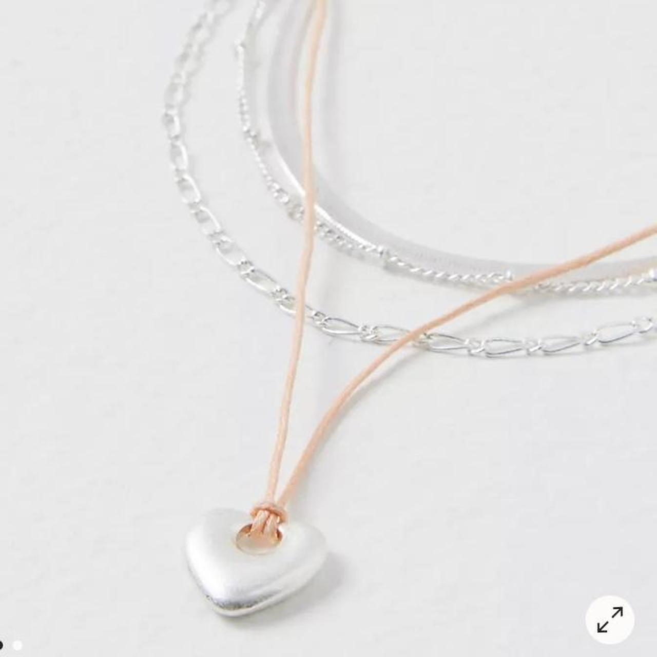 Silver layered necklace with pink string and silver... - Depop