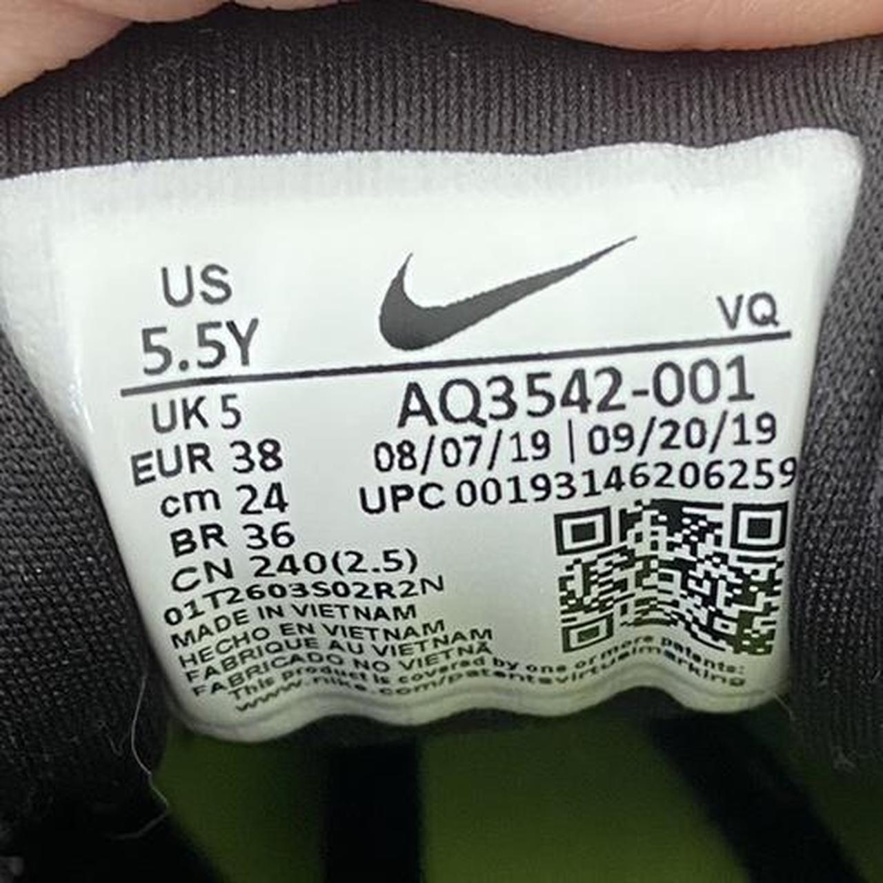 Black Nike running trainers - Depop