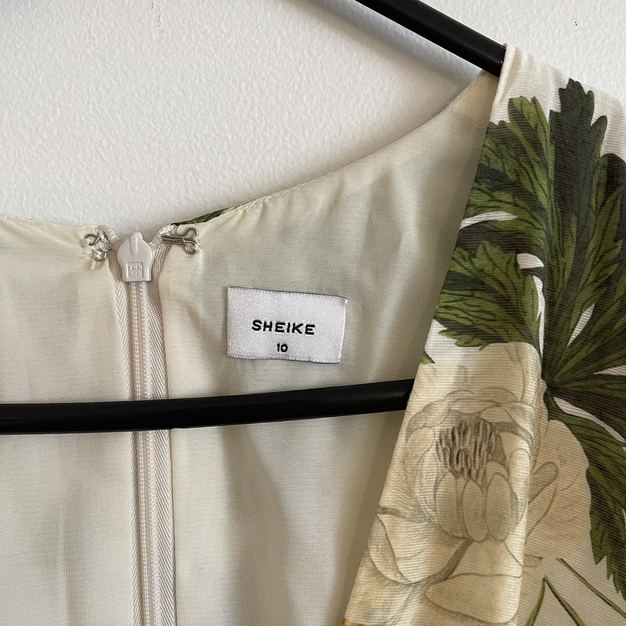 Sheike dress size 10. Some tearing in the fabric... - Depop