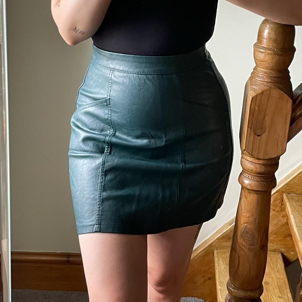 New look dark green mini skirt, not real leather,... - Depop
