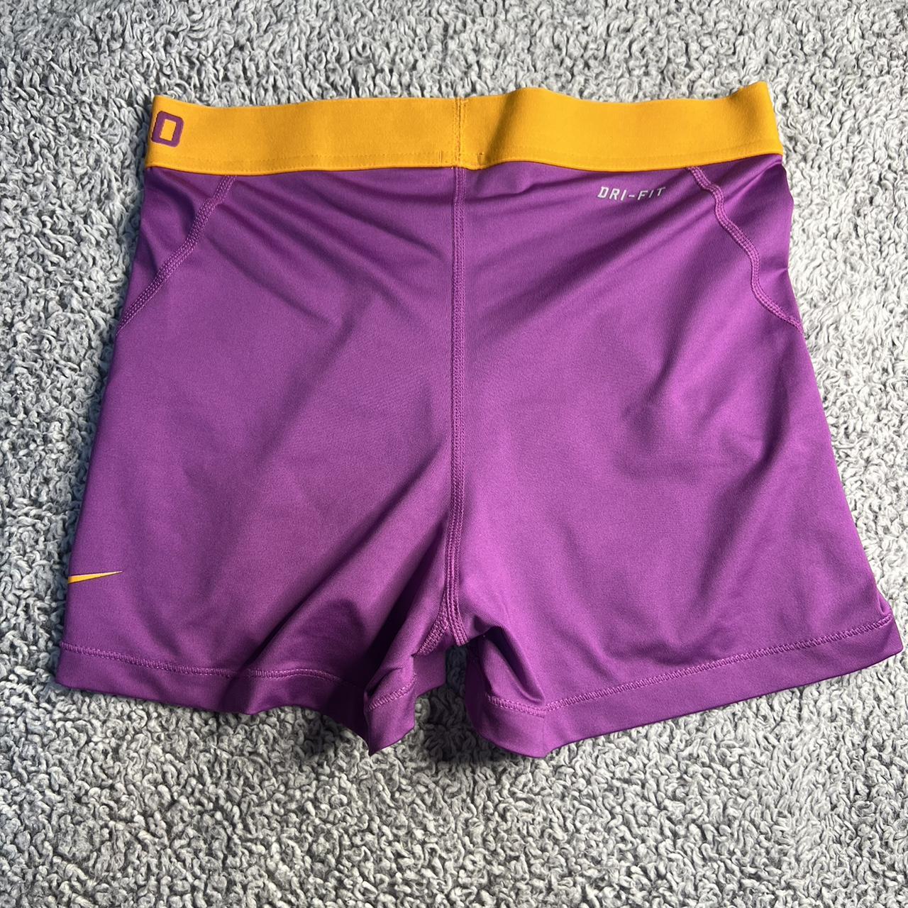 ️purple and orange NIKE pro compression shorts... - Depop