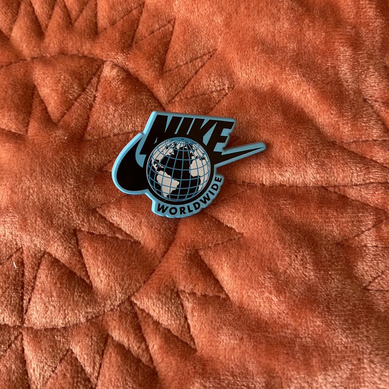 nike worldwide pin - Depop