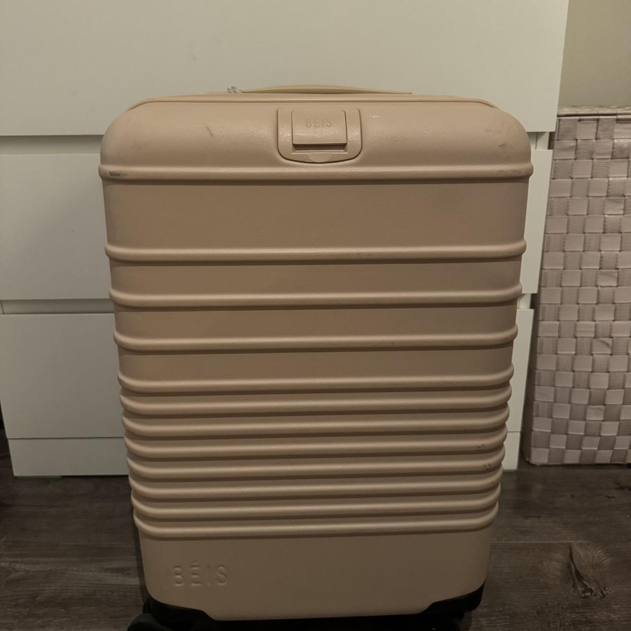 Beis carry-on suitcase with a few washable stain... - Depop