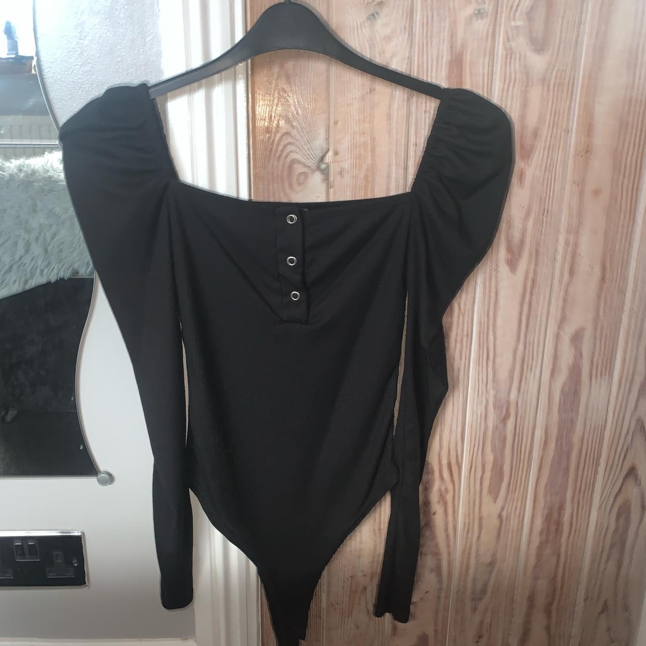 Black body suit with puffer sleeves - Depop