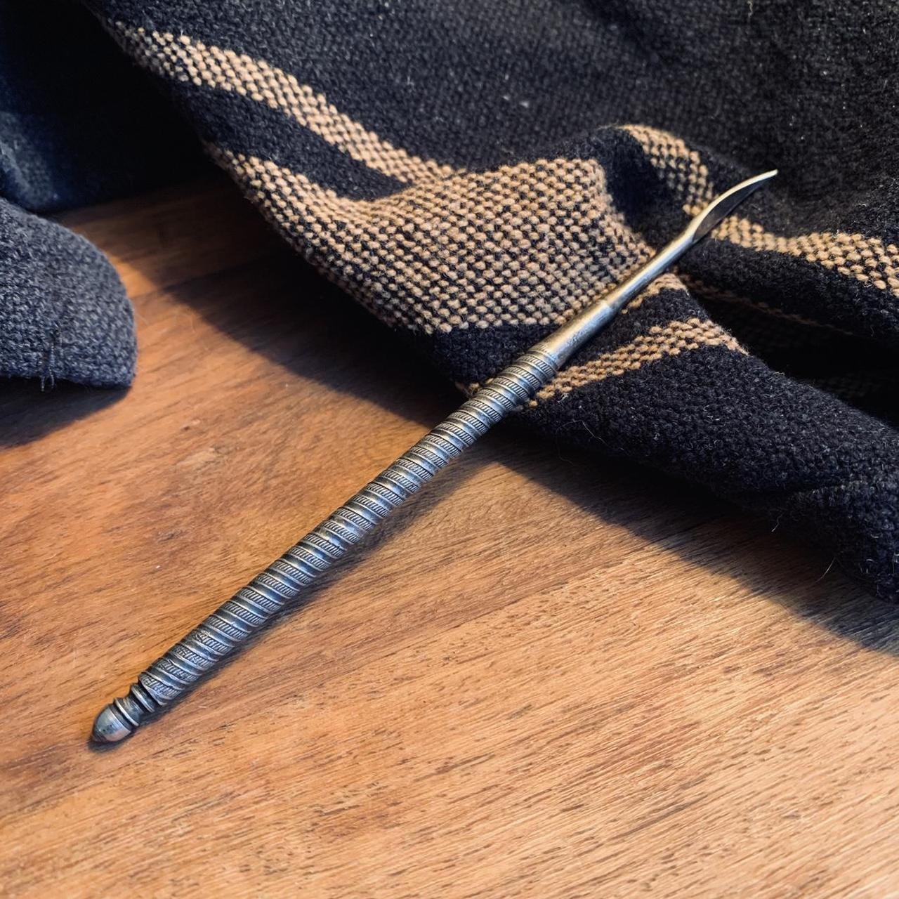 Ornately-carved metal walnut pick. Multiple uses.... - Depop