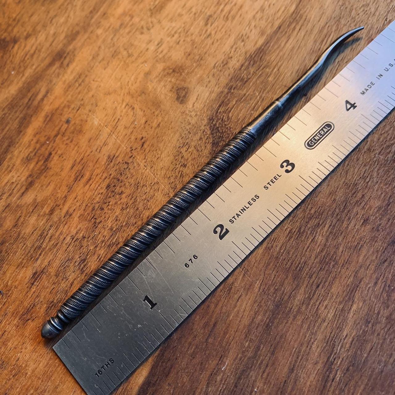 Ornately-carved metal walnut pick. Multiple uses.... - Depop