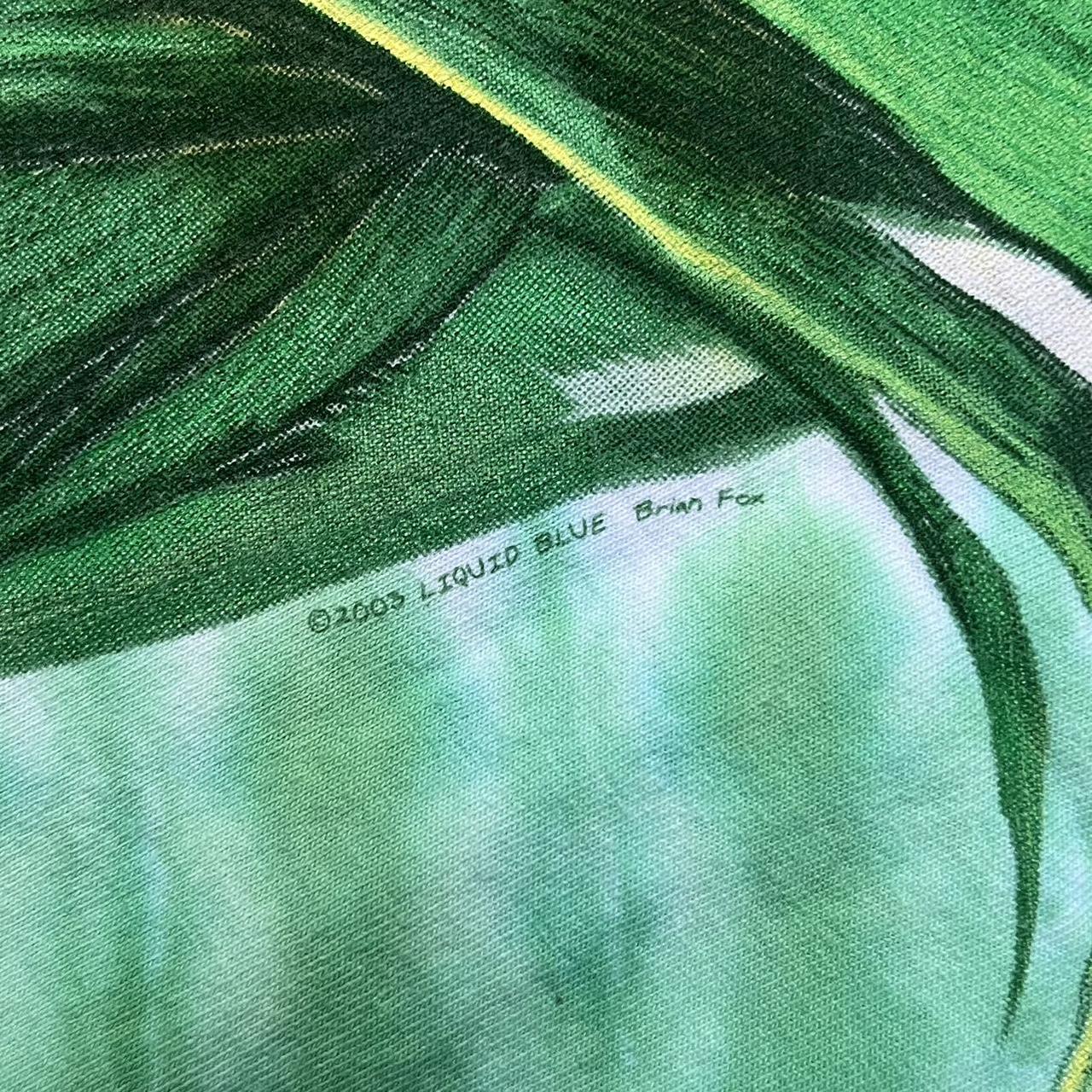 03’ single stitch liquid blue corn AOP.... - Depop