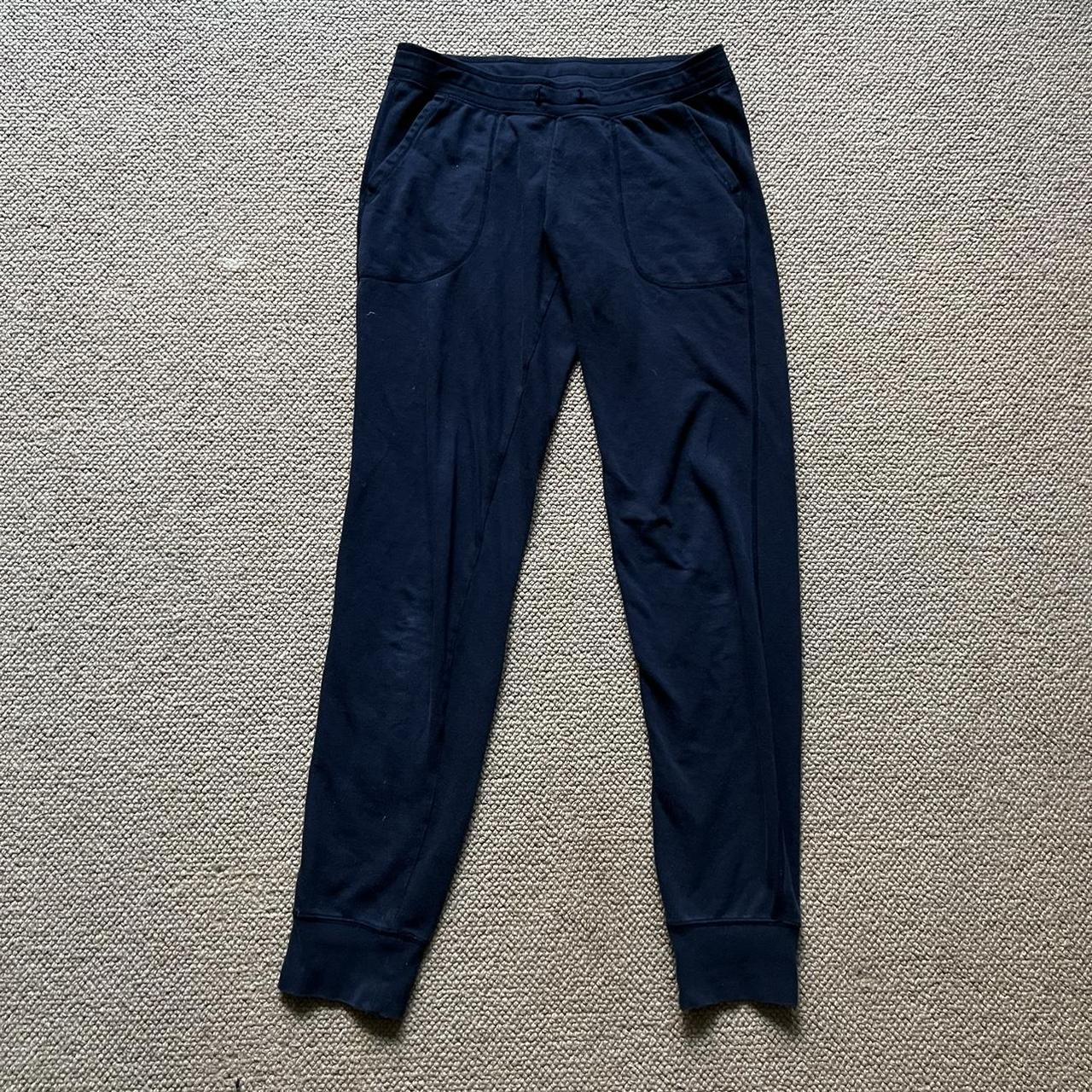 Uniqlo cuffed tapered navy deep blue joggers with... - Depop
