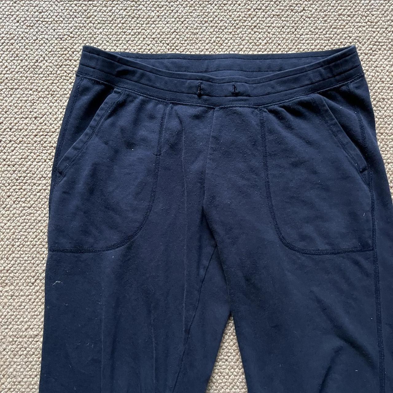 Uniqlo cuffed tapered navy deep blue joggers with... - Depop