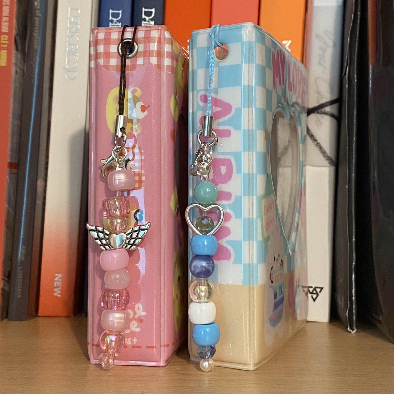 blue and pink pc binder charms can be used as... - Depop