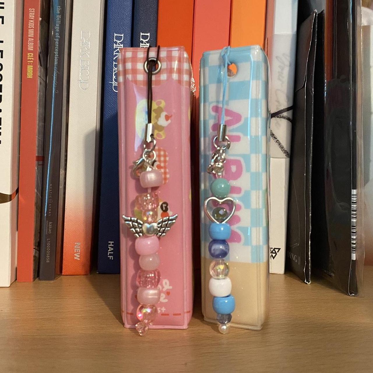 blue and pink pc binder charms can be used as... - Depop