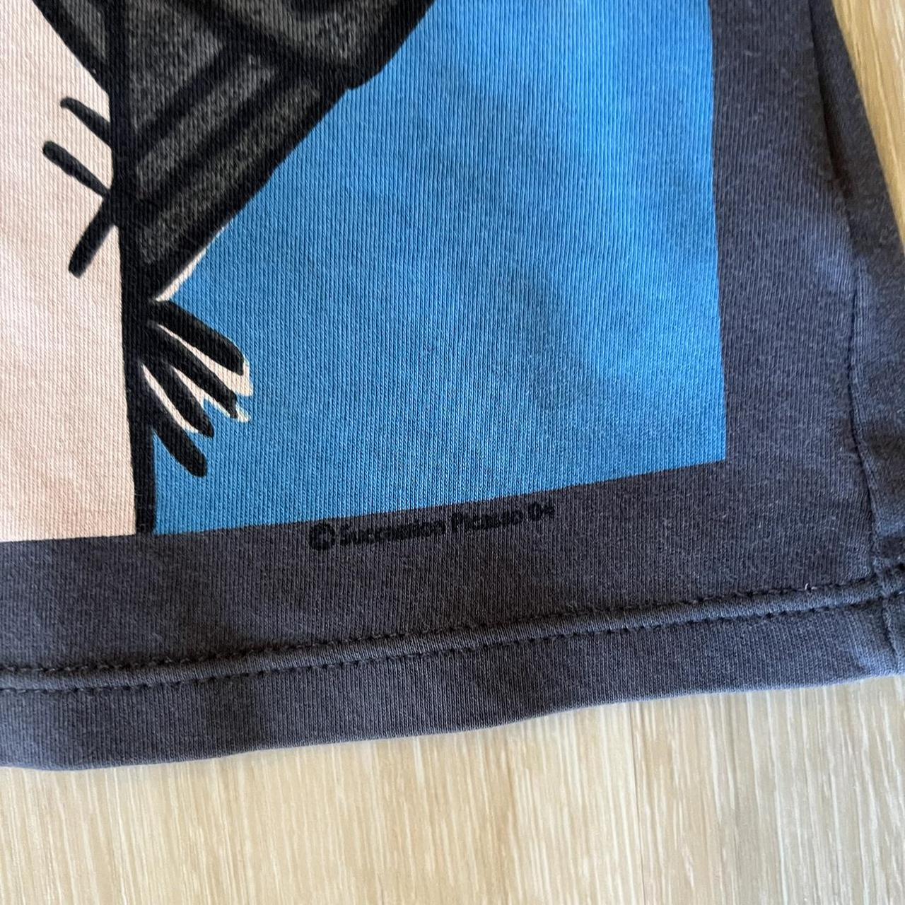 the coolest vintage Picasso tank! says size M but... - Depop