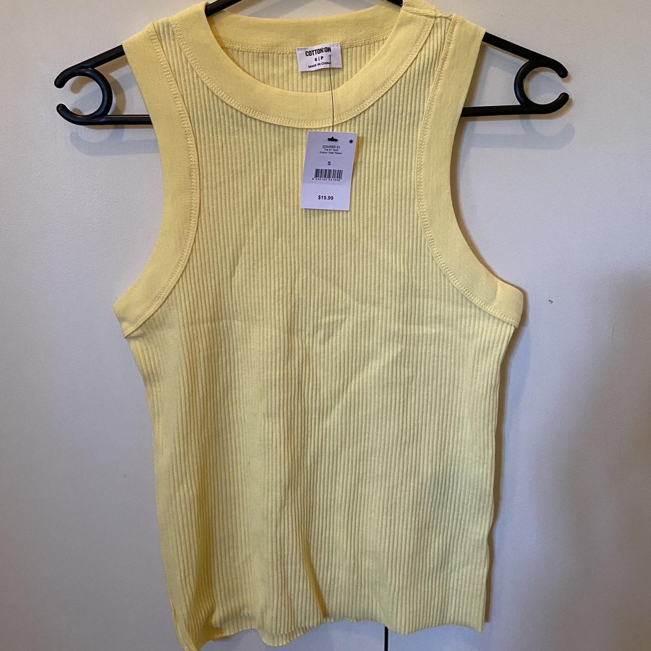 Two singlets, Ghanda blue and cotton on yellow Both... - Depop