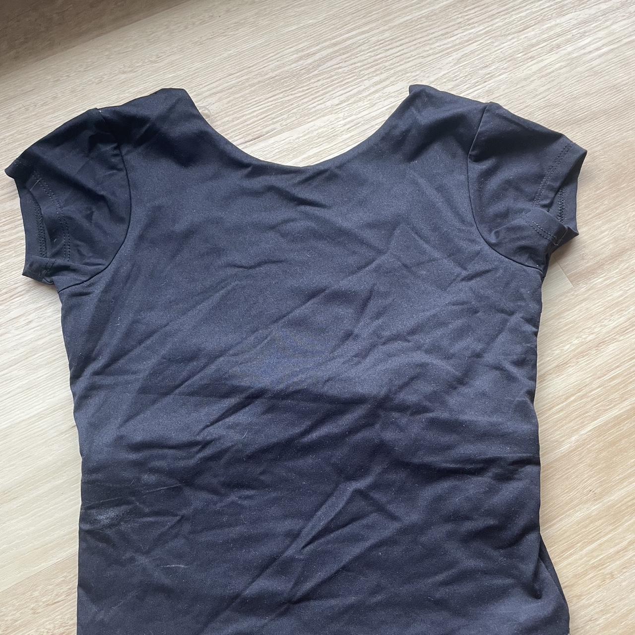 Black backless top, brand new still with tag never... | Depop