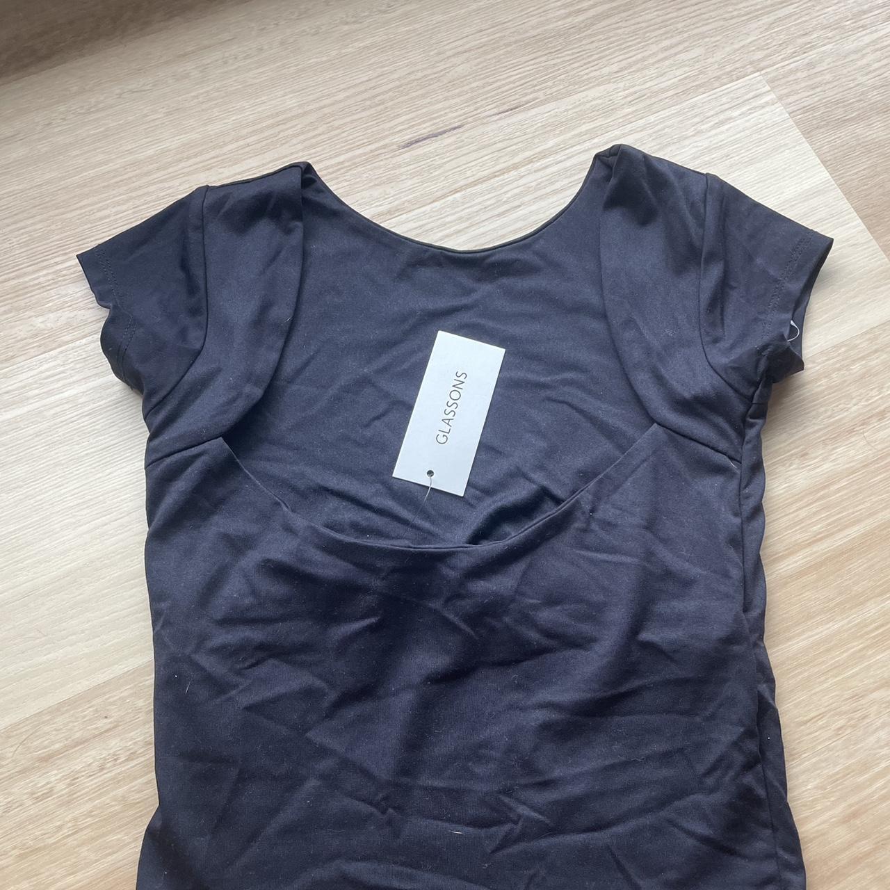 Black backless top, brand new still with tag never... | Depop