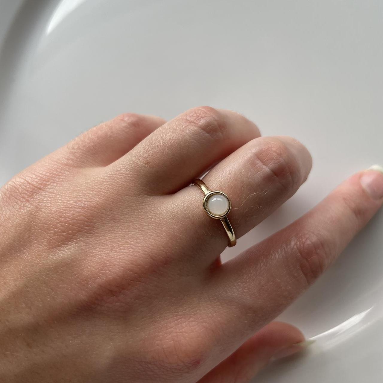 Lovely milky white stone, gold band ring Message me... - Depop
