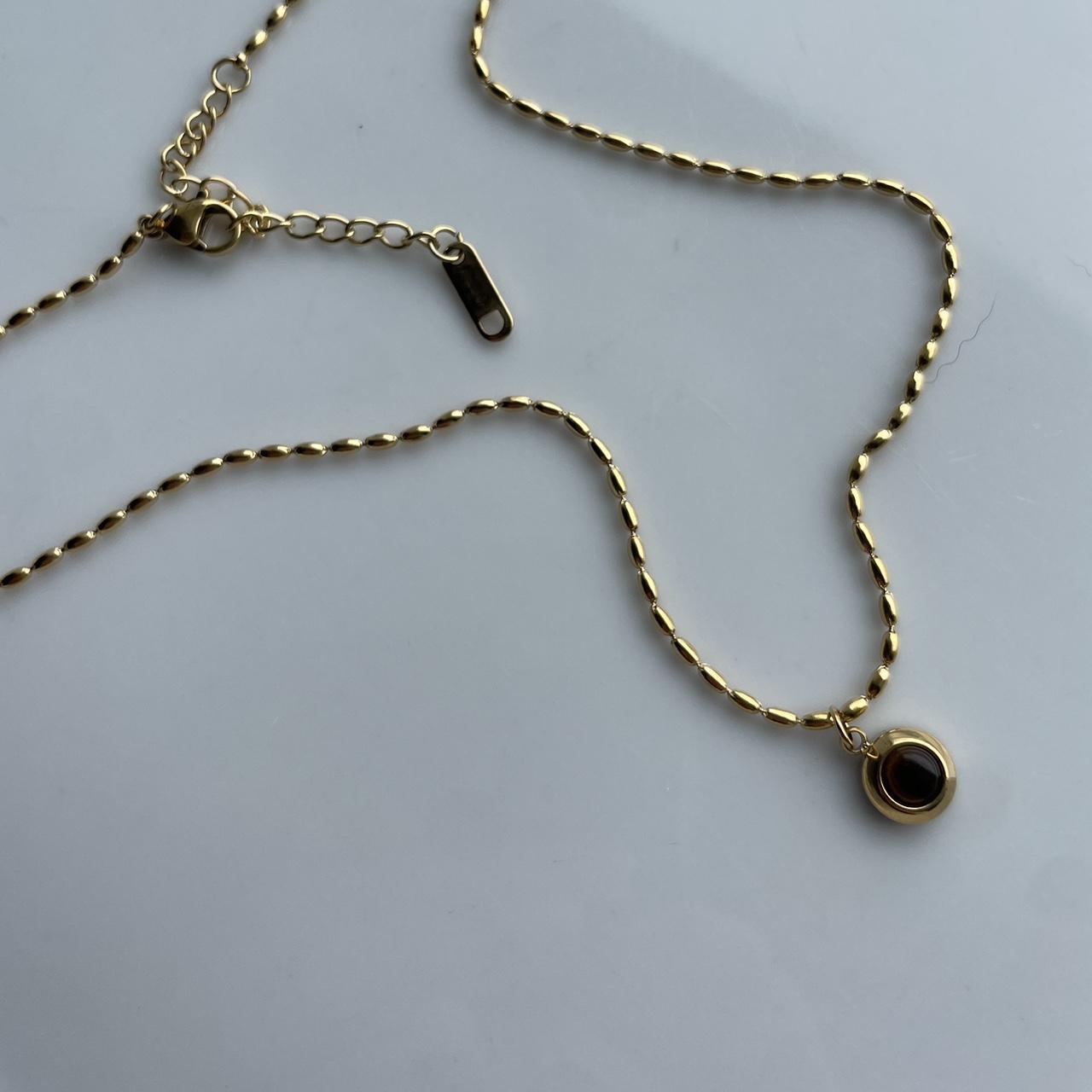 Adorable classy, simplistic gold chain necklace with... | Depop